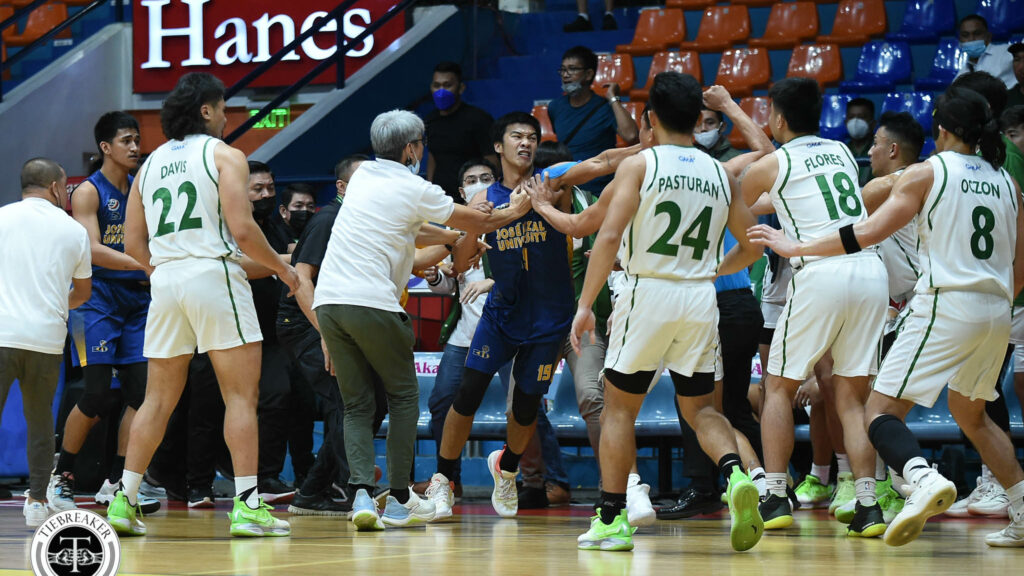John Amores loses top once again, strikes three Blazers in on-court melee